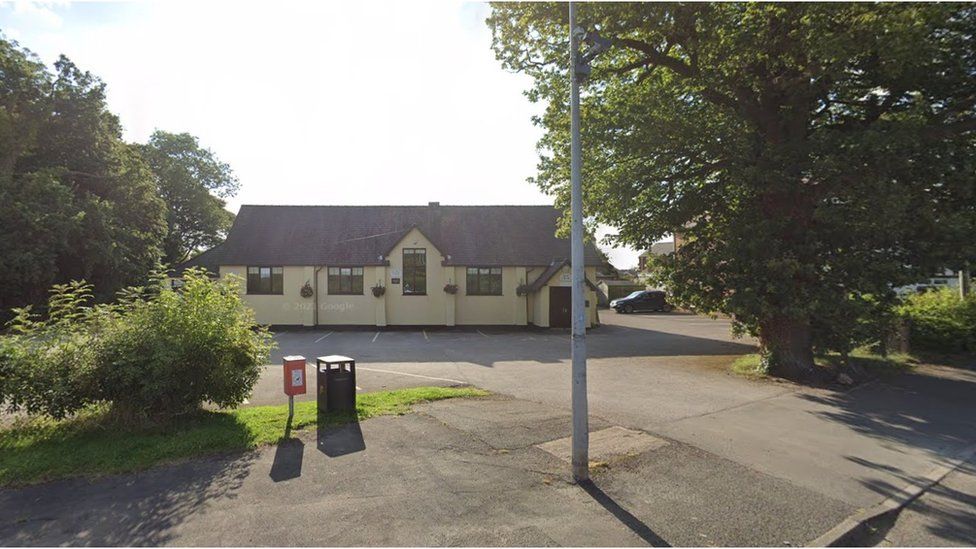 Man, 74, died of head injury after Sychdyn car collision - BBC News