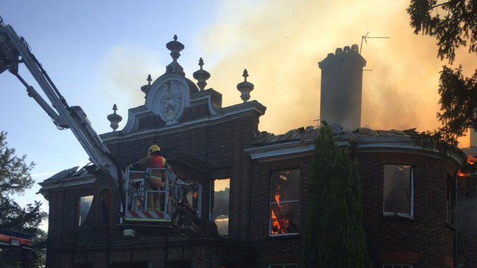 Fire at Betley Court manor house - BBC News