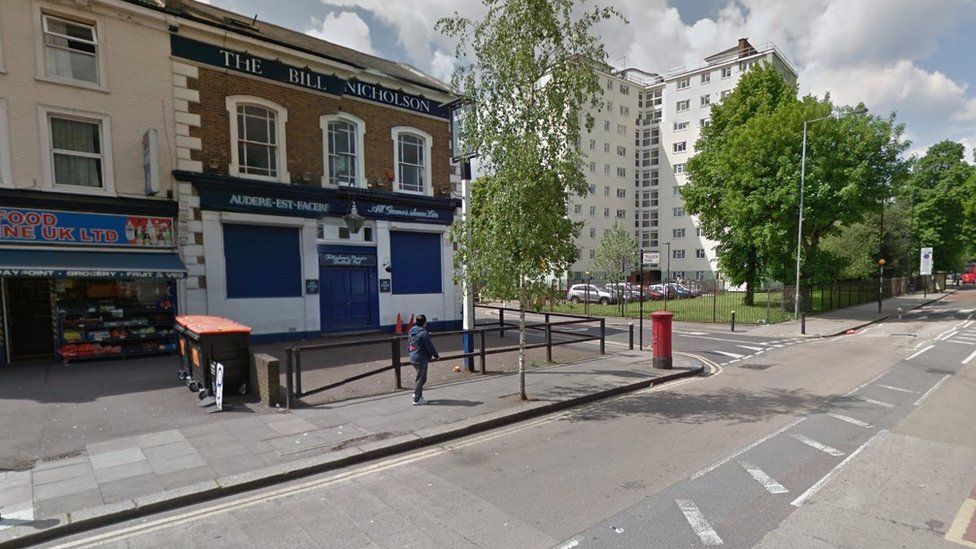 Man dead and woman injured in Tottenham pub flat - BBC News