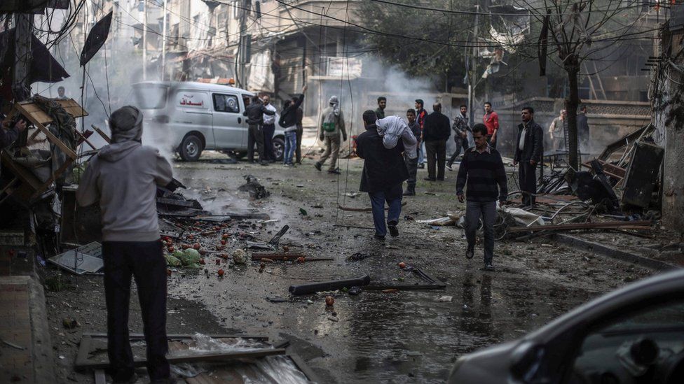 Syria crisis: Assad says no transition while 'terrorists' remain - BBC News