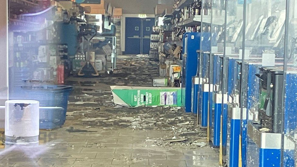 Shops across Bristol damaged after torrential rain - BBC News