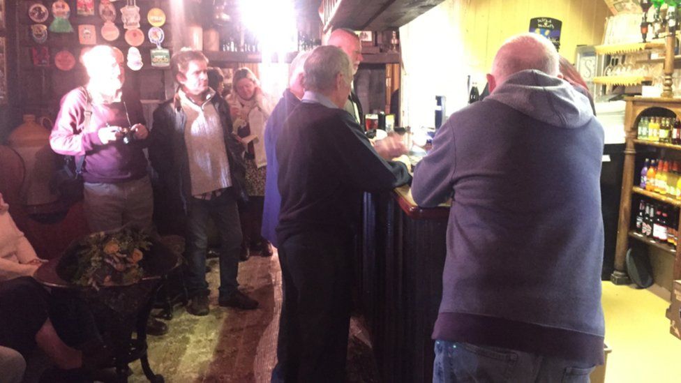 Community share pub Tafarn Sinc officially reopens - BBC News
