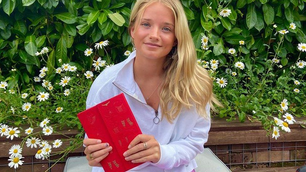 Stolen book of late mother's writings returned to owner - BBC News