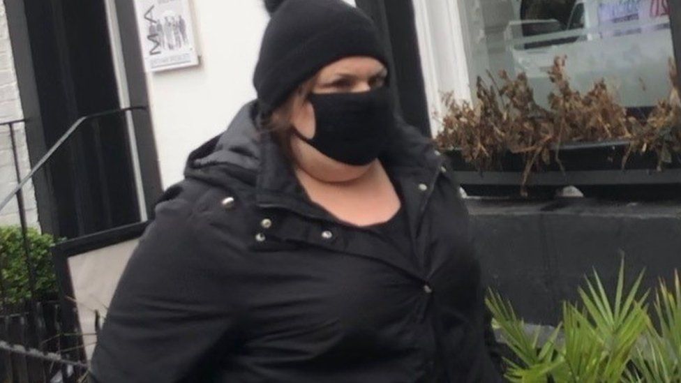Woman who had child abuse images given community order - BBC News
