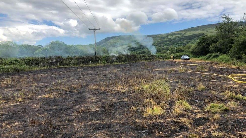 Isle of Man agricultural fire 'gets out of hand' - BBC News