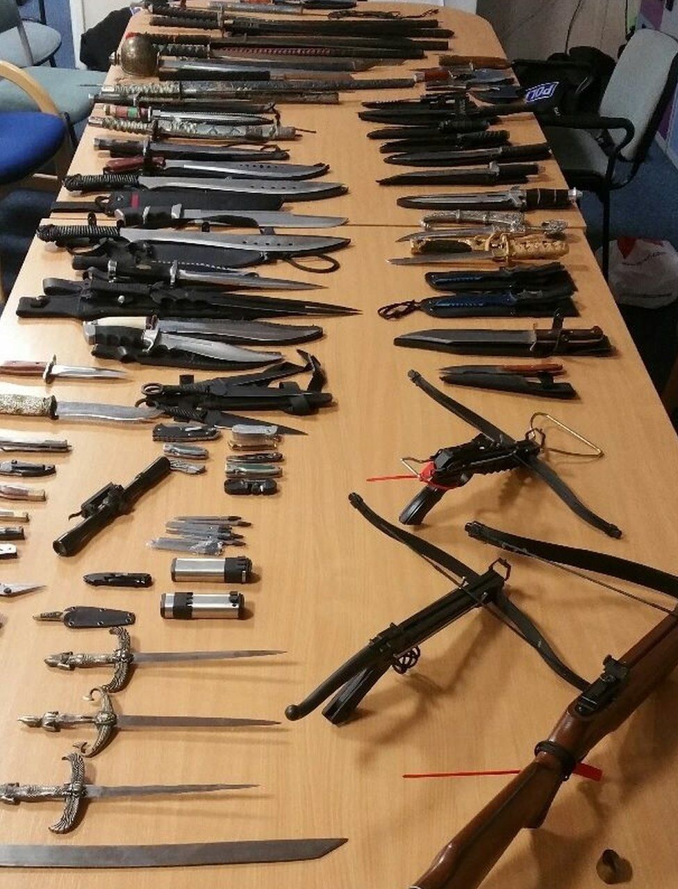 Guns, axes, crossbows and swords found in St Helens shed - BBC News