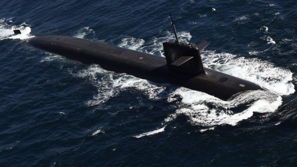Emmanuel Macron aboard France's Le Terrible nuclear submarine - BBC News