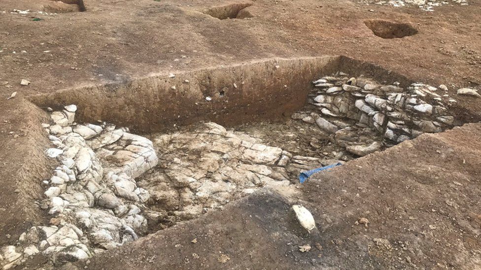Roman and prehistoric remains uncovered by new road construction - BBC News