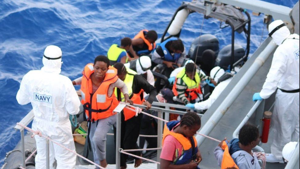 LÉ Róisín: Irish naval ship rescues 371 people from three boats - BBC News