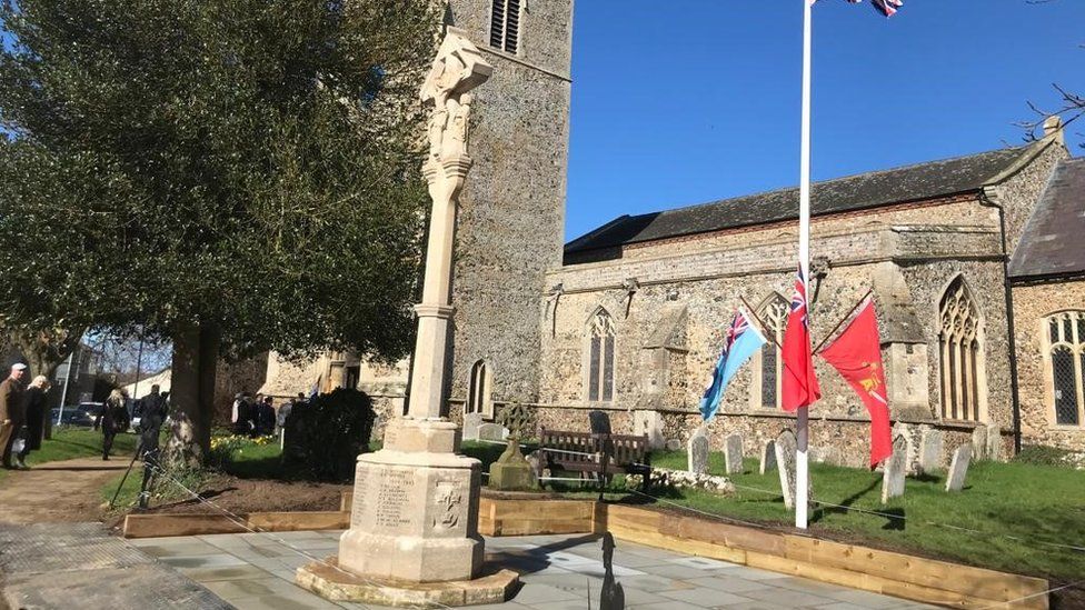 Haughley's war memorial is revamped and rededicated - BBC News