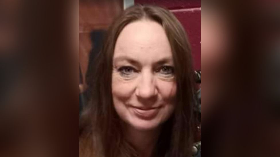 Leeds murder accused in court after woman found dead - BBC News