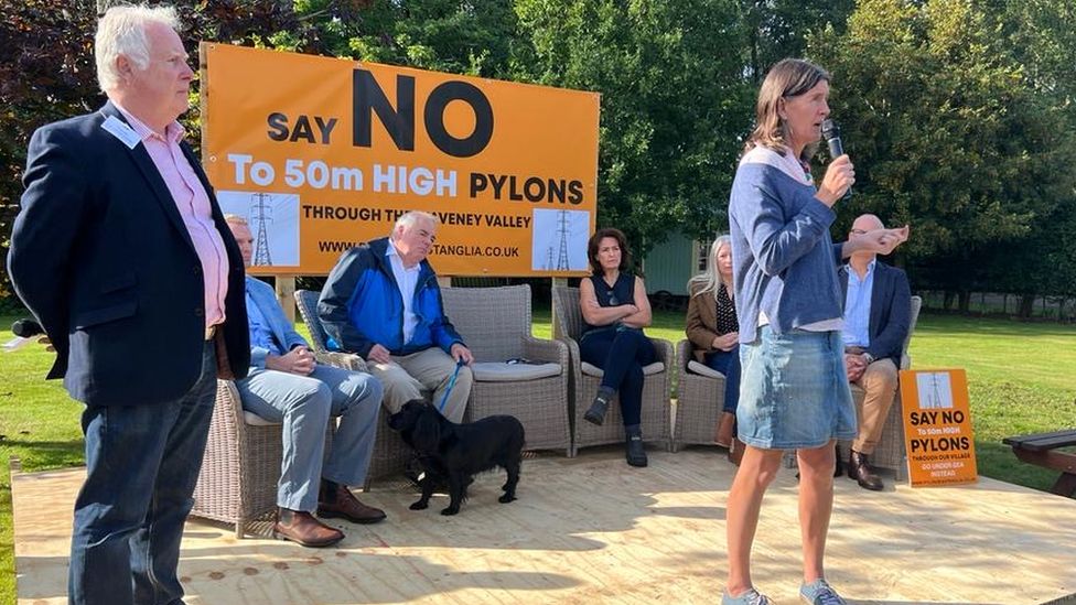 East Anglia campaigners gather to protest against pylon plans - BBC News