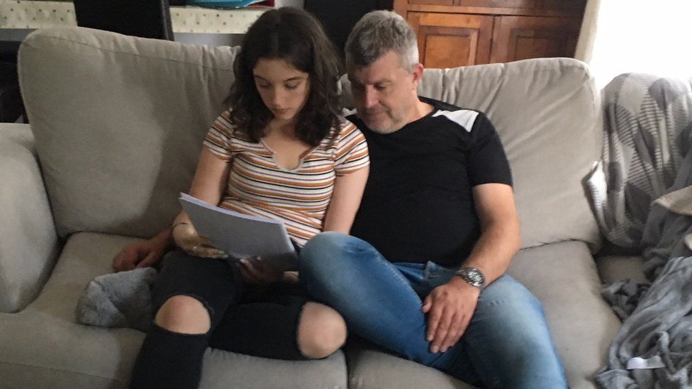 Devon dad writes novels to inspire young pilot daughter - BBC News