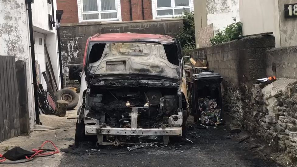 Londonderry: Police treating van fire as arson attack - BBC News