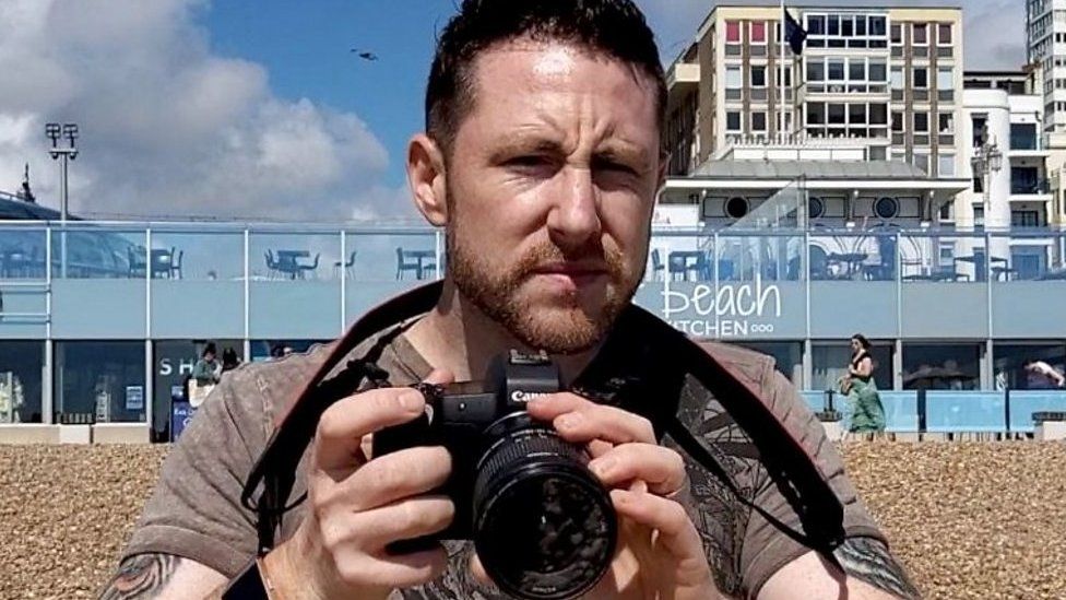 Autistic and deaf man gains photography award - BBC News