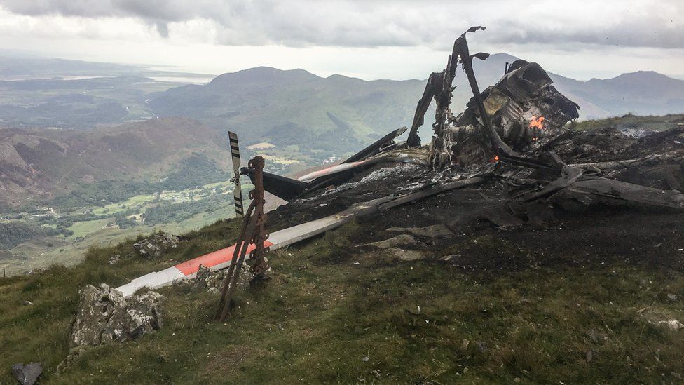 RAF helicopter fire on Snowdonia peak after technical issue - BBC News