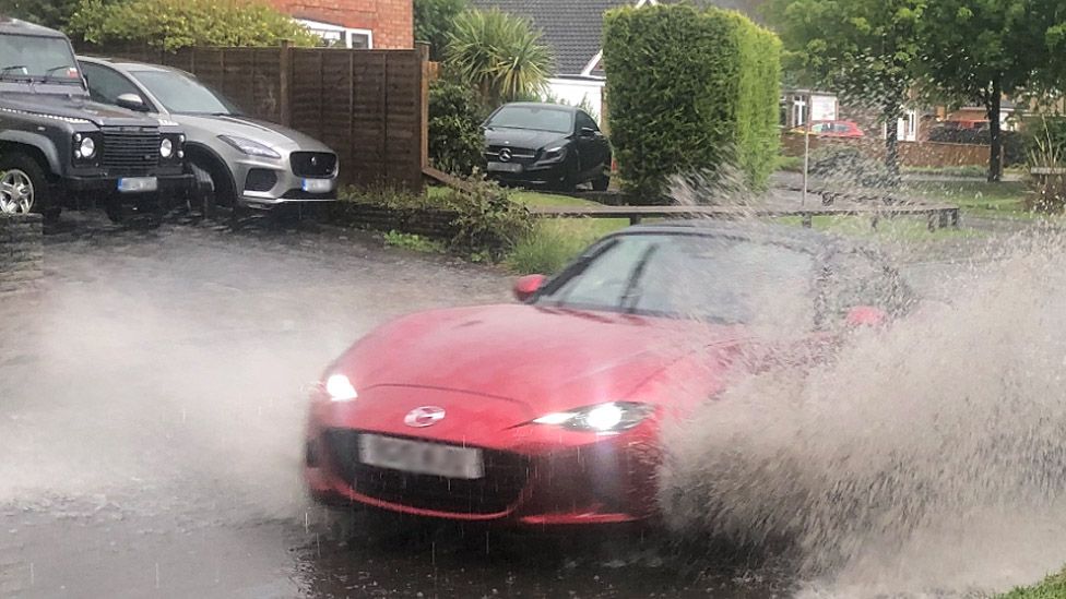 Storms: Homes and hospital damaged in flash floods - BBC News