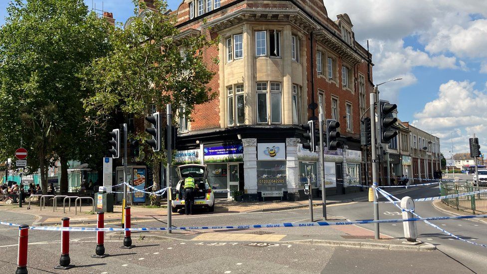 Boscombe arrest after woman reportedly falls from window - BBC News