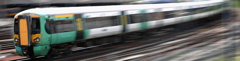 Southern rail services cut from timetable as dispute continues - BBC News