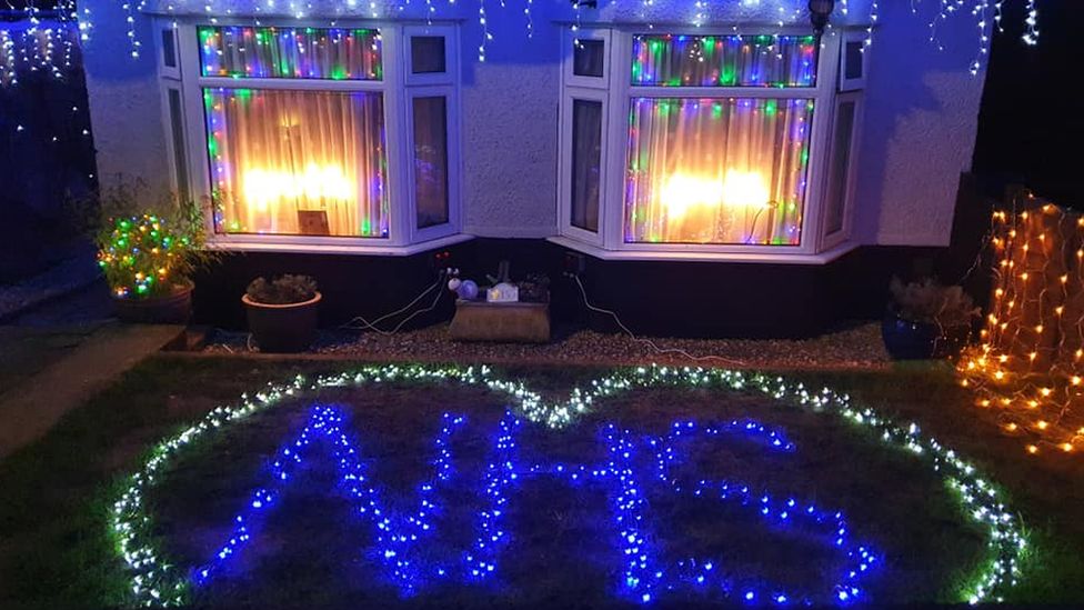Covid-19: Late Christmas decorations 'light up lockdown' - BBC News