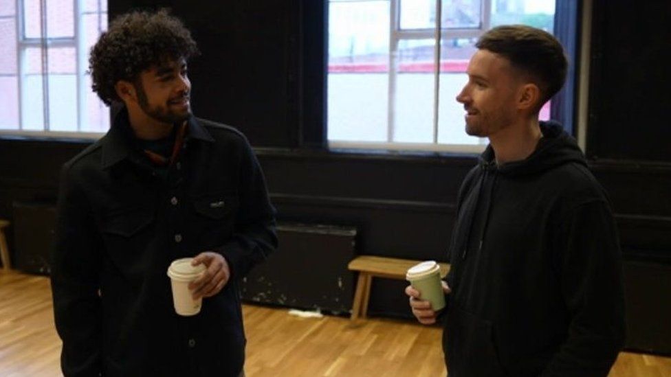 His Dark Materials star Amir Wilson reunited with drama tutors - BBC News