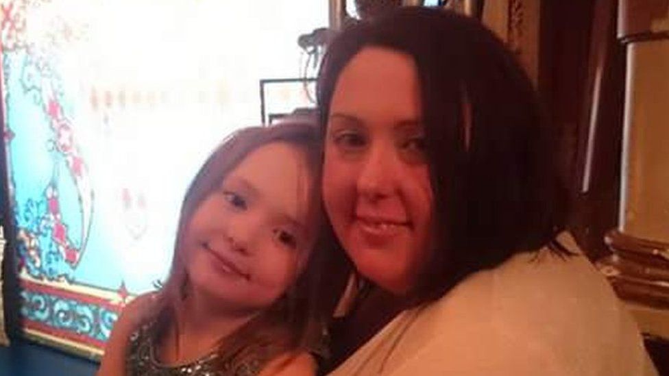 Disney mug taken off sale after lid stuck on girl's tongue - BBC News