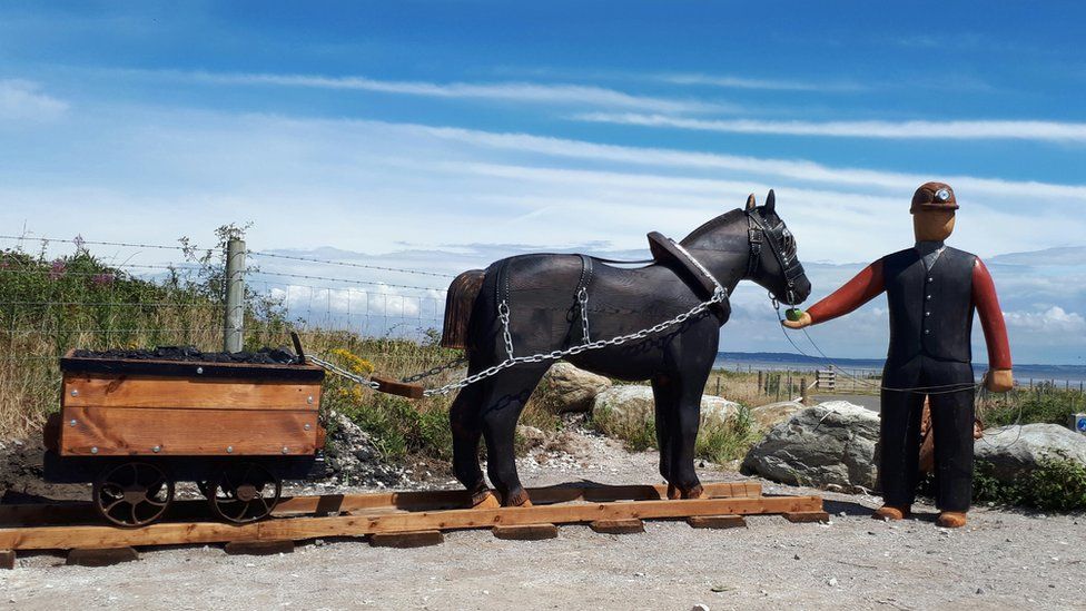 Pit pony sculpture unveiled at Point of Ayr colliery site - BBC News