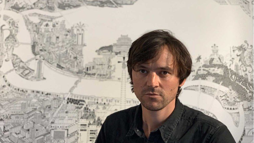 Artist Gareth Fuller draws tourist map of Pyongyang - BBC News