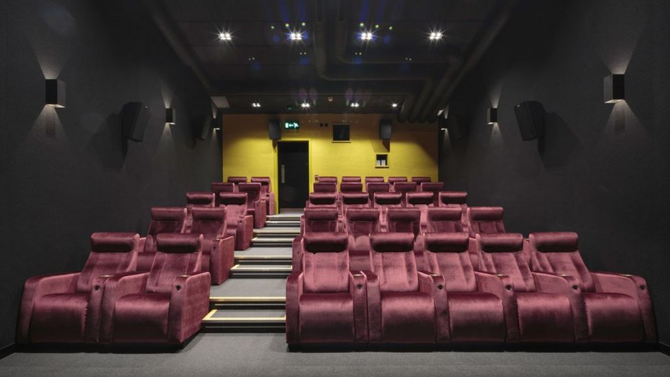 Converting a caravan into a tiny cinema - BBC News