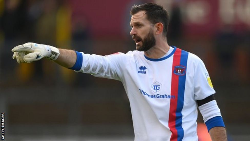 Wrexham sign goalkeeper Mark Howard as defenders depart - BBC Sport