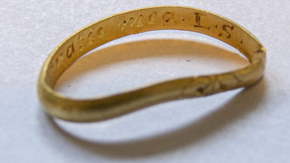 Gold ring found in Shropshire field declared treasure - BBC News