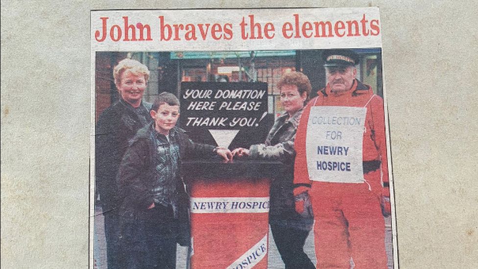 Newry's 80-year-old Black Santa sits out for festive fundraiser - BBC News