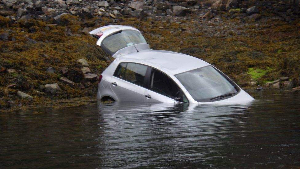 Runaway car rolls off Skye pier into sea - BBC News