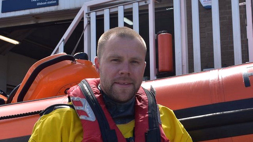 Man saved from New Brighton stormy seas meets his rescuers - BBC News