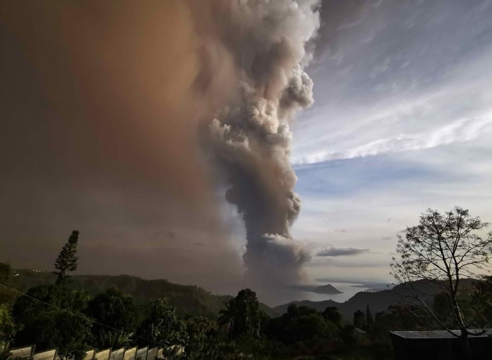 In pictures: Taal erupts and coats Philippines towns in ash - BBC News