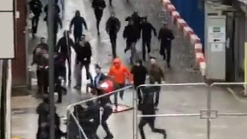 Manchester derby: Man held after object thrown at striker Haaland - BBC ...