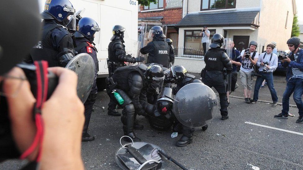 Belfast trouble: Woman loses claim against PSNI over baton round - BBC News