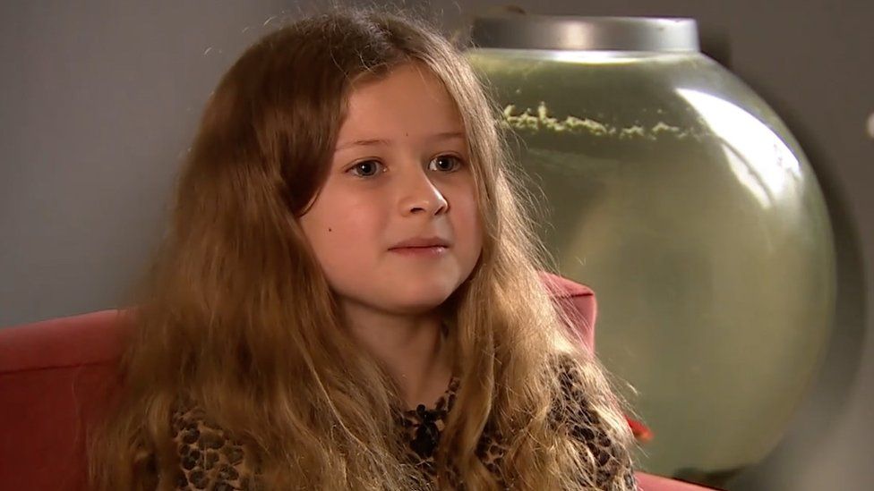 Greg Gilbert's niece takes on swimming challenge in his memory - BBC News