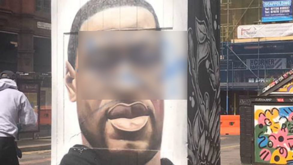 Manchester Gay Village murals defaced with homophobic graffiti - BBC News