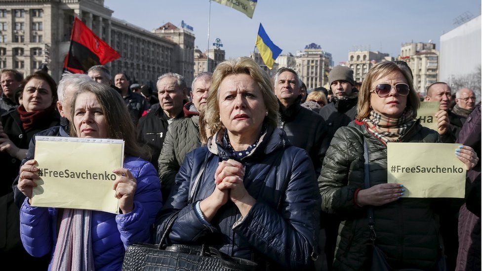 Ukrainians attack Russia embassy over captured pilot - BBC News
