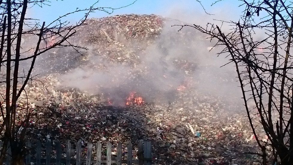 The villagers of Great Heck living by a burning pile of rubbish - BBC News