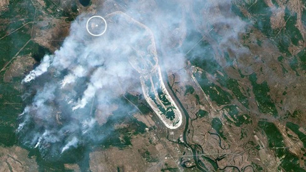 Chernobyl fire under control, Ukraine officials say - BBC News