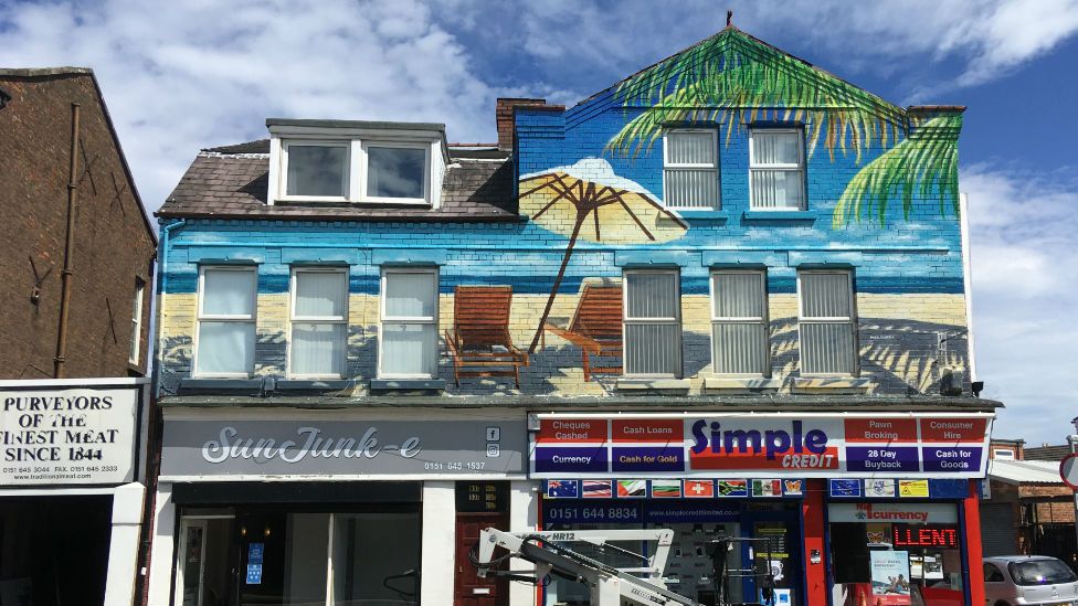 New Ferry: Artist's mural tributes to community hit by blast - BBC News