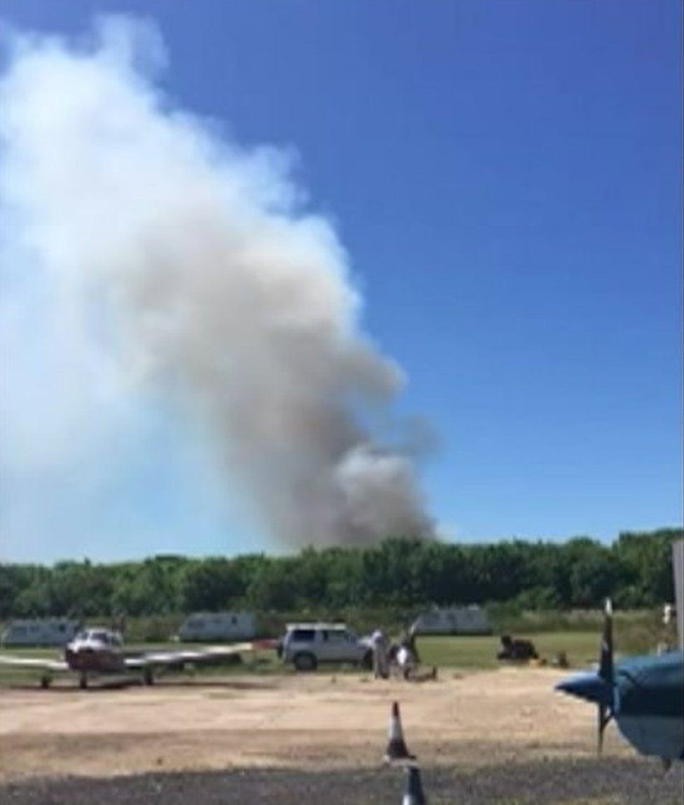 Enstone light aircraft crash causes barn fire - BBC News