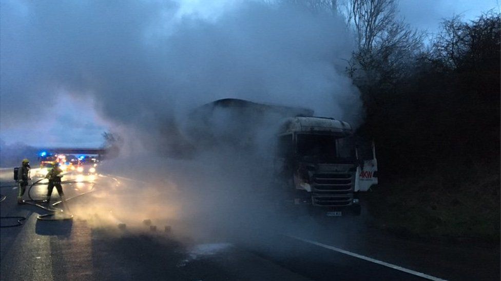 Sports drinks tins 'explode' in M6 lorry fire in Staffordshire - BBC News