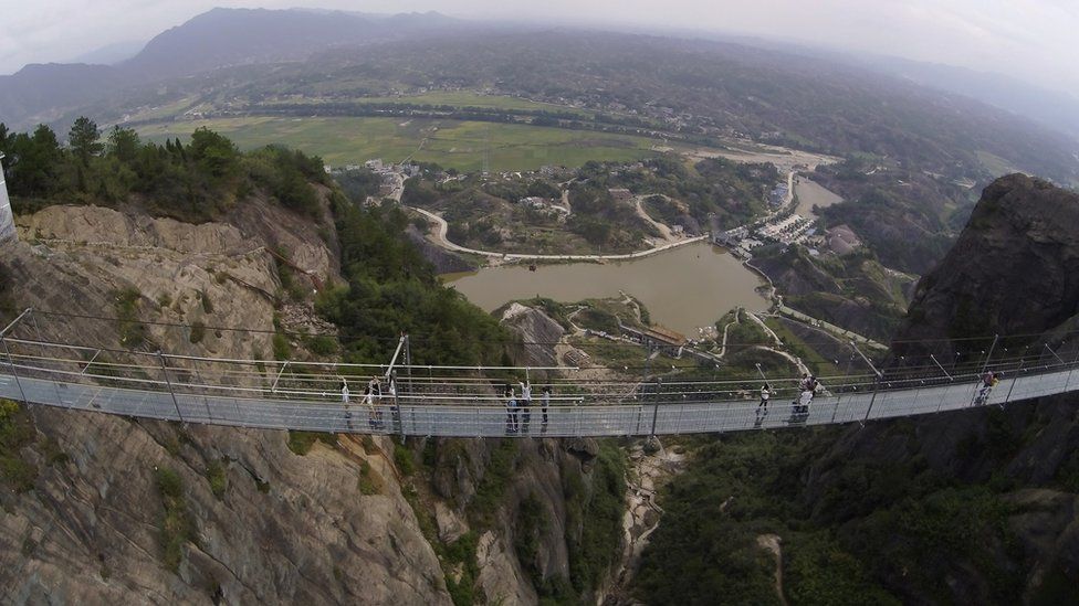 Amazing glass bottomed bridge opens over canyon - BBC Newsround