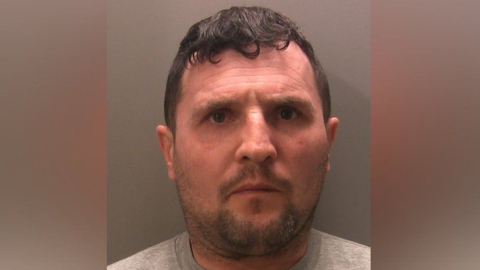 Workington killer jailed again for punching woman's helpers - BBC News