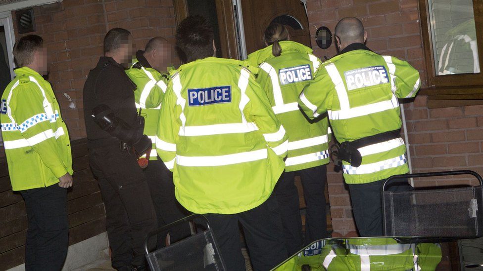 Salford raids: Police arrest 24, seize drugs, find cannabis farm - BBC News