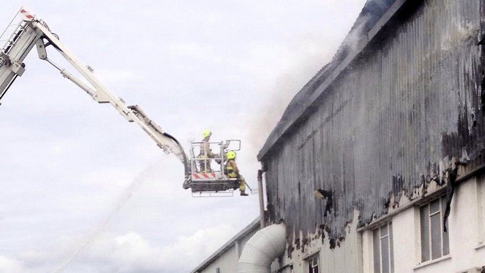 Hangar on fire by Southend Airport runway - BBC News