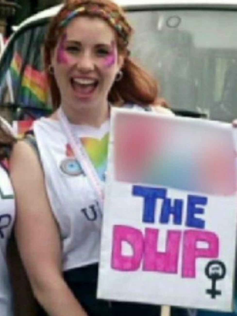 Belfast Pride: Woman questioned over anti-DUP sign - BBC News
